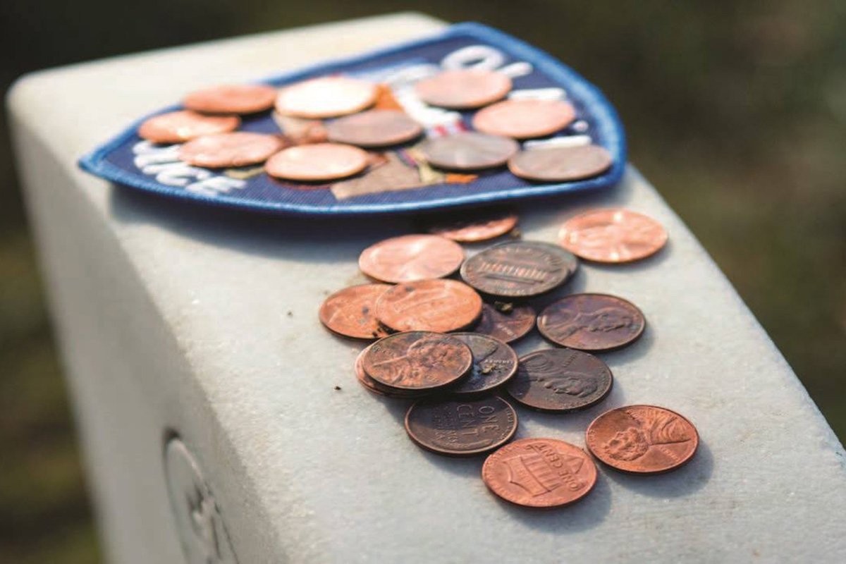 What Do Those Coins Left on Soldiers’ Graves Actually Mean? | Coffee or Die