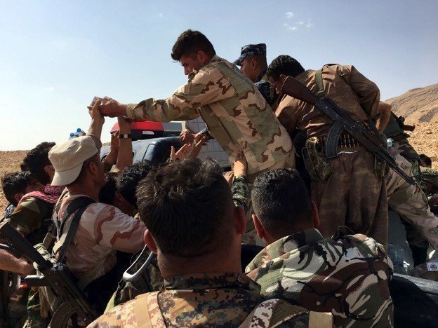 While ISIS Fights on from the Shadows, Iraq Celebrates ‘Victory Day ...