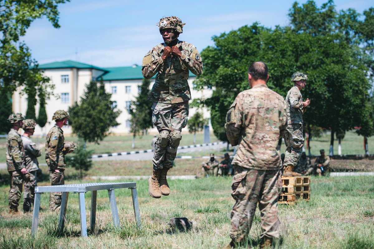 Paratrooper Nails ‘Atomic Leg Drop’ Landing — on Concrete | Coffee or Die