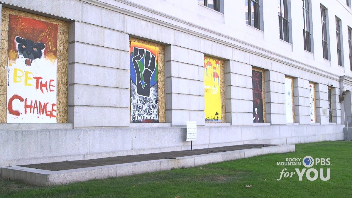 With messages of change, student paintings cover shattered windows at ...