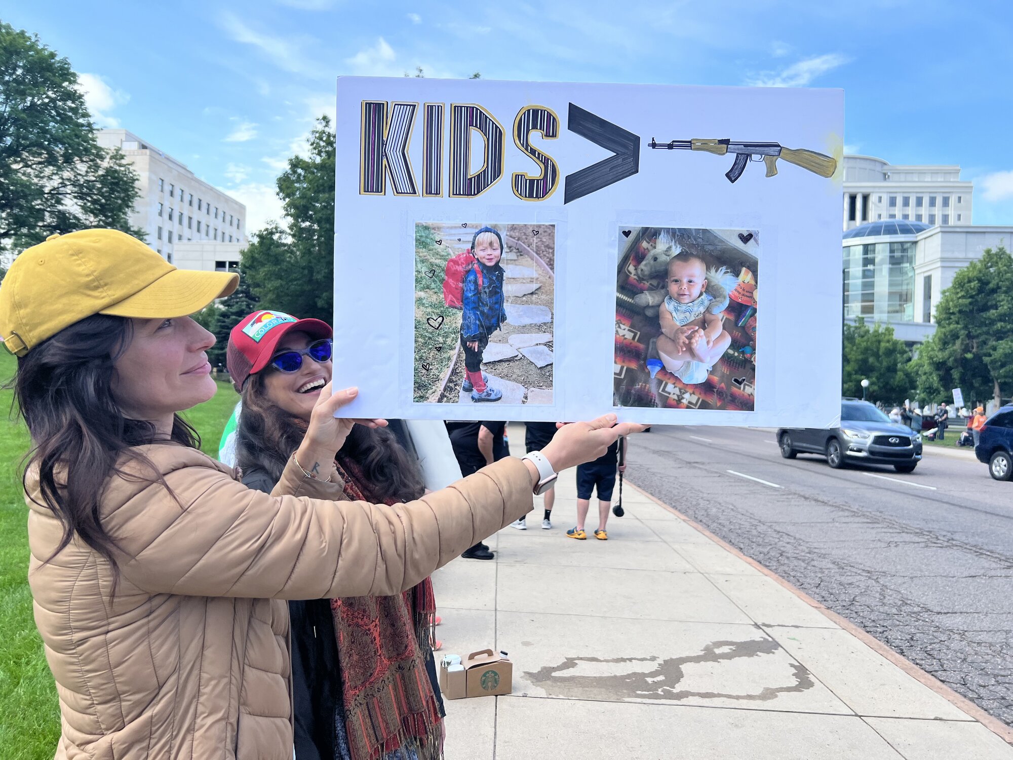 Gun control activists protest at state Capitol, urge Gov. Polis to ban ...