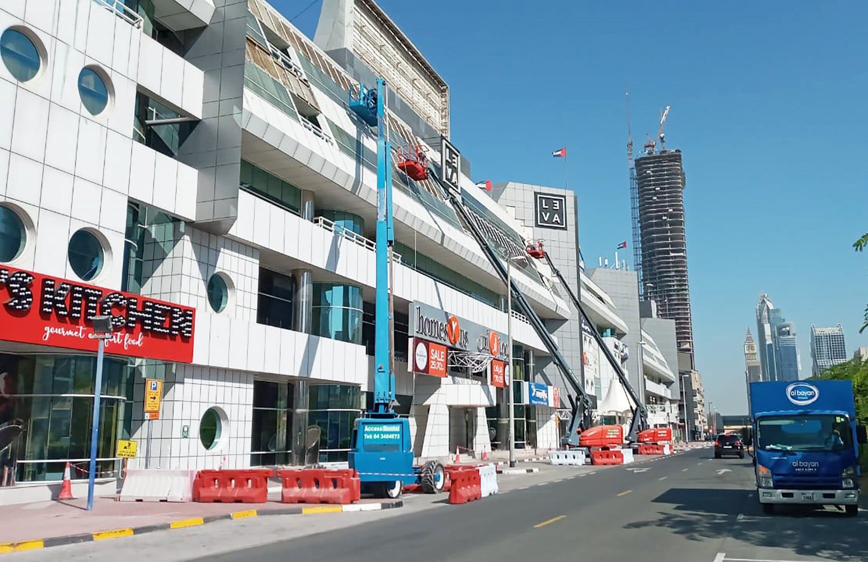 Cladding Access Equipment - Boom and Scissor Lifts for Installation ...